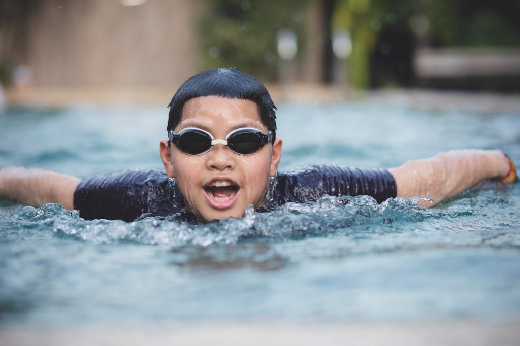 Does Swimming Build Muscle: A Beginner’s Guide To Lean Physique