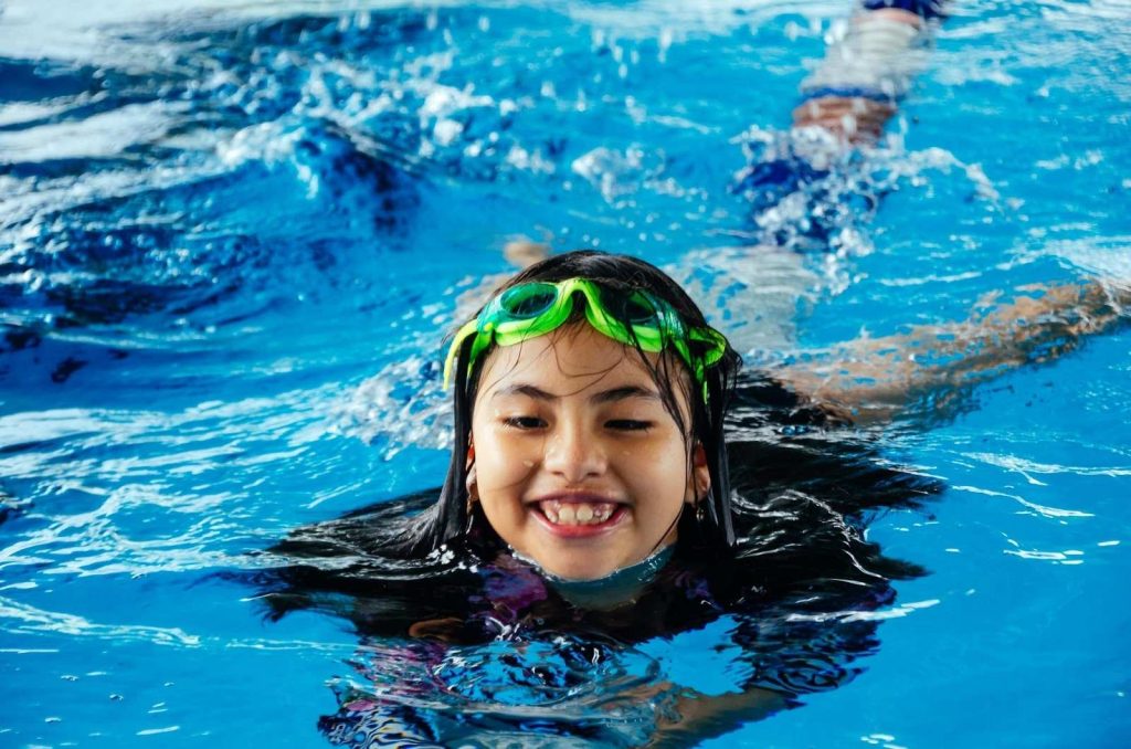 Does Swimming Build Muscle: A Beginner’s Guide To Lean Physique